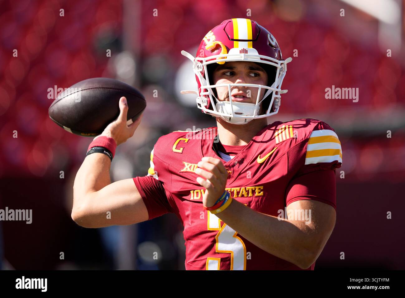 Iowa State quarterback Rocco Becht warms up before an NCAA college ...