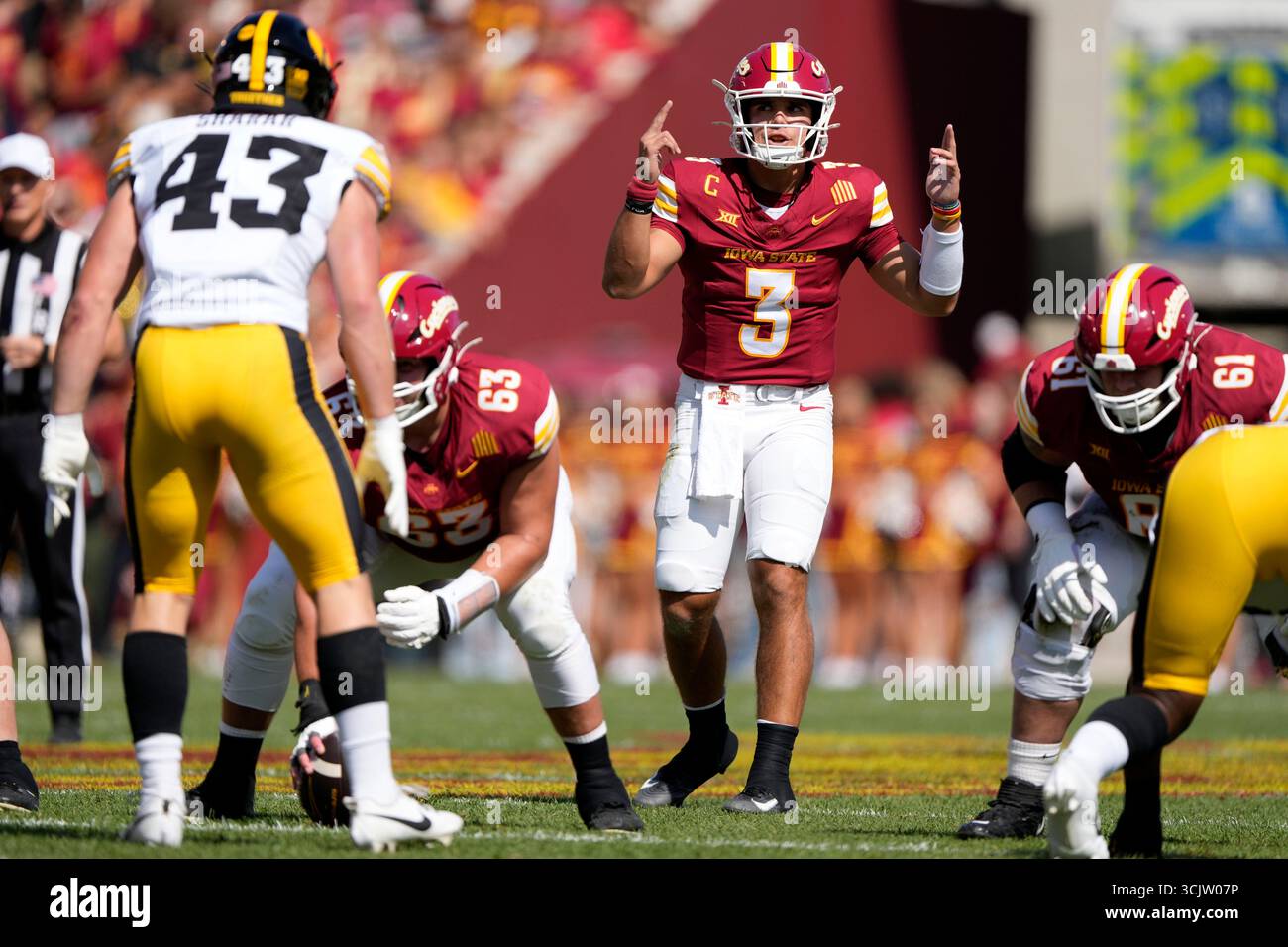 Iowa State quarterback Rocco Becht (3) signals teammates during the ...