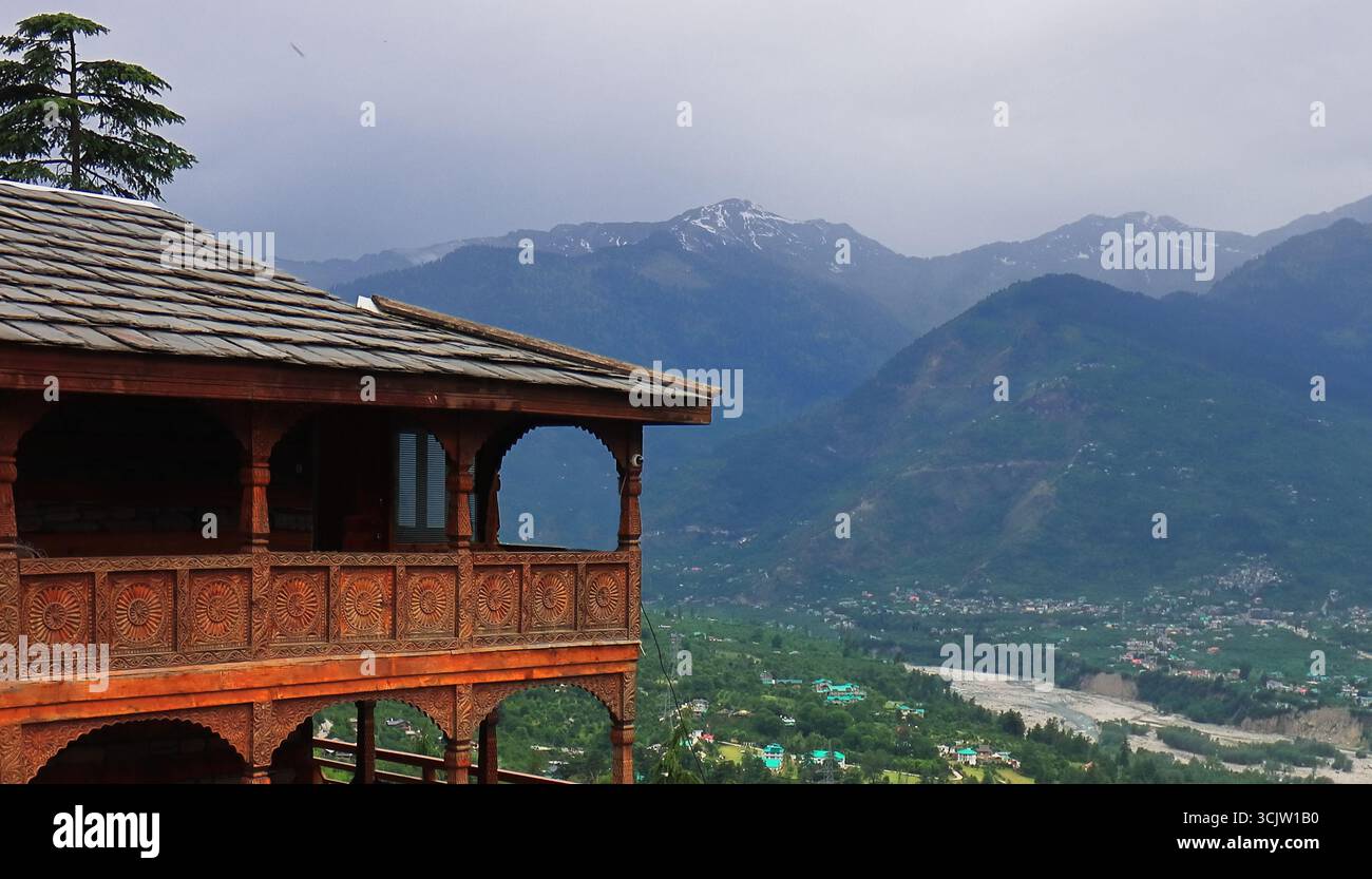 scenic view of lush green valley and himalaya mountains from naggar ...