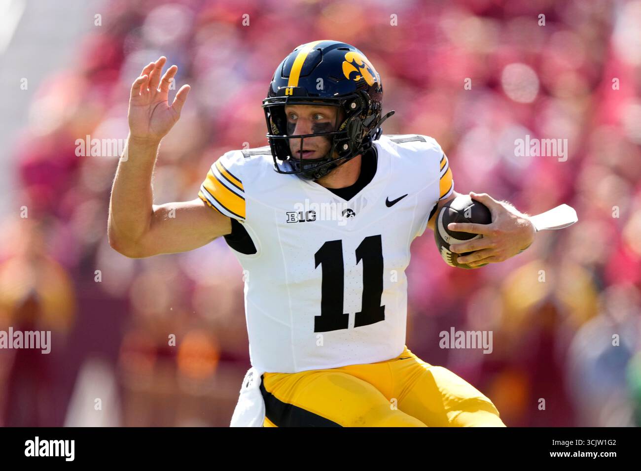 Iowa quarterback Mark Gronowski runs up field during the first half of ...