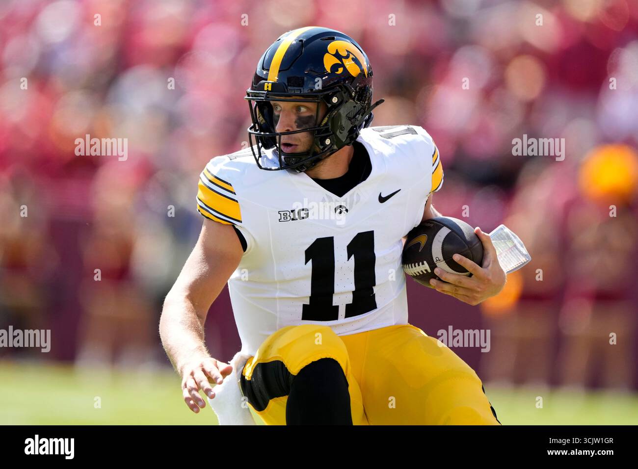 Iowa quarterback Mark Gronowski runs up field during the first half of ...