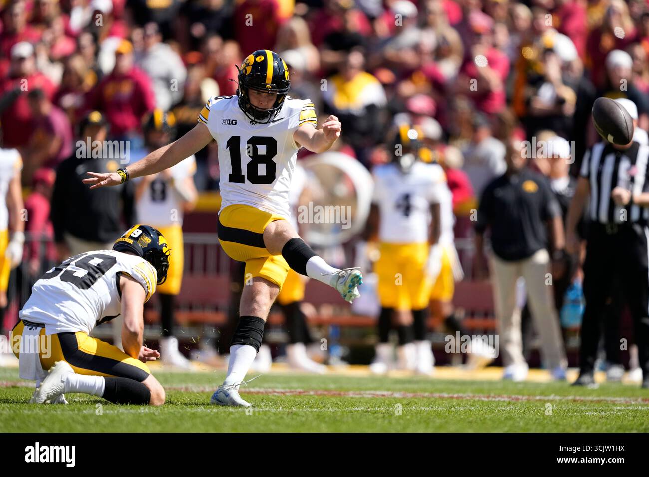 Iowa place kicker Drew Stevens (18) kicks a field goal during the first ...