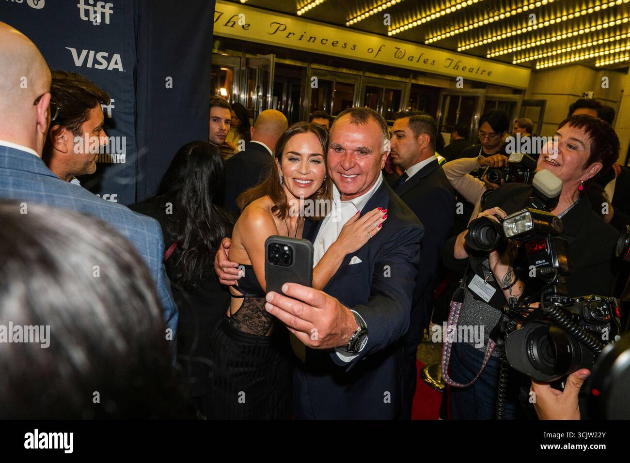 Emily Blunt takes a selfie on the red carpet for "The Smashing Machine ...
