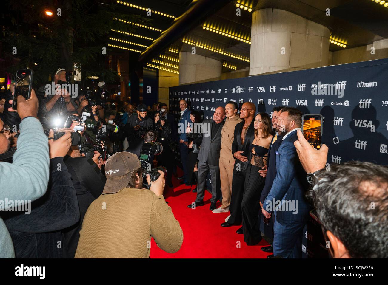 Left to right, Bas Rutten, Oleksandr Usyk, Dwayne Johnson, Emily Blunt ...