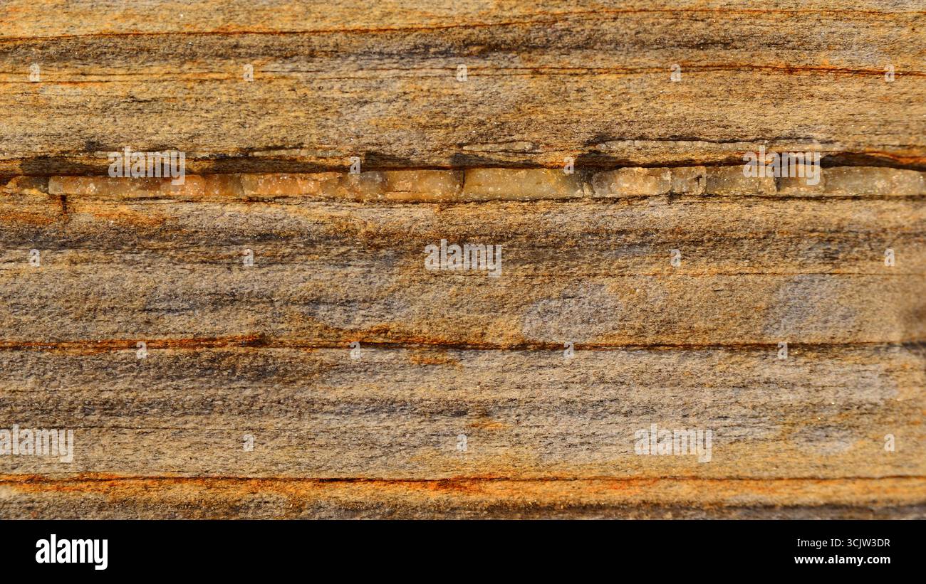 Sedimentary rock stratified into multiple perfect layers in the Earth's ...