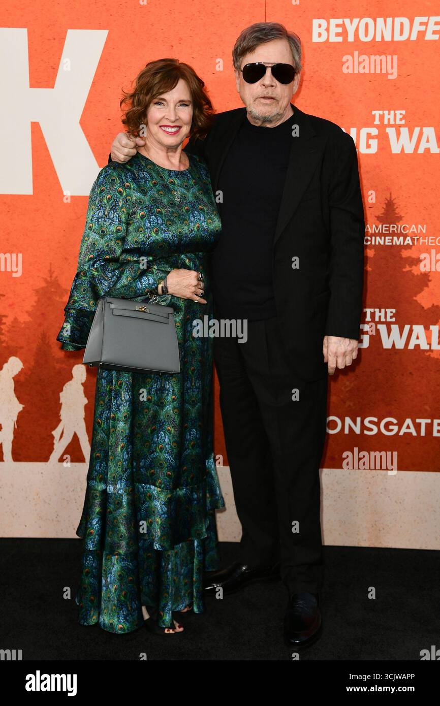 Mark Hamill, left, and Marilou York arrive at the premiere of "The Long ...