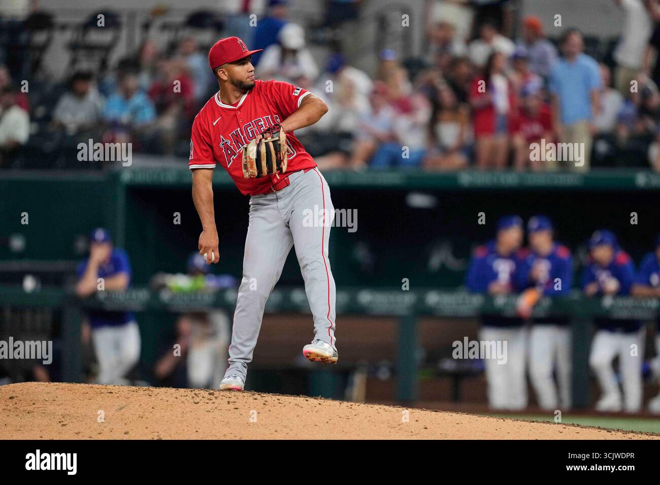 Los Angeles Angels position player Oswald Peraza throws to the Texas ...