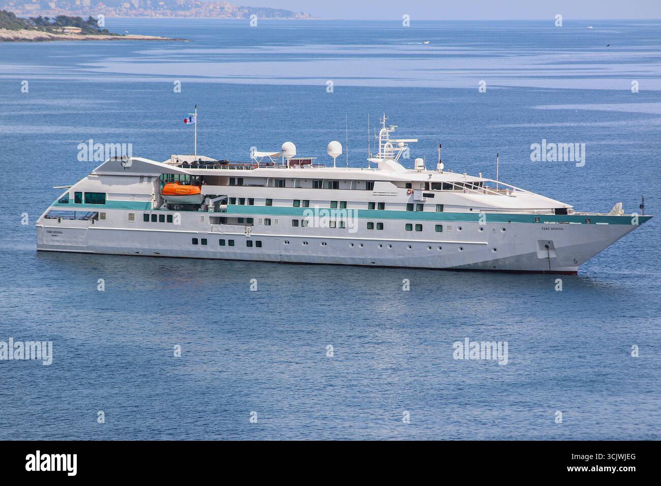 Small cruise ship TERE MOANA (Paul Gauguin Cruises) at anchor in front ...