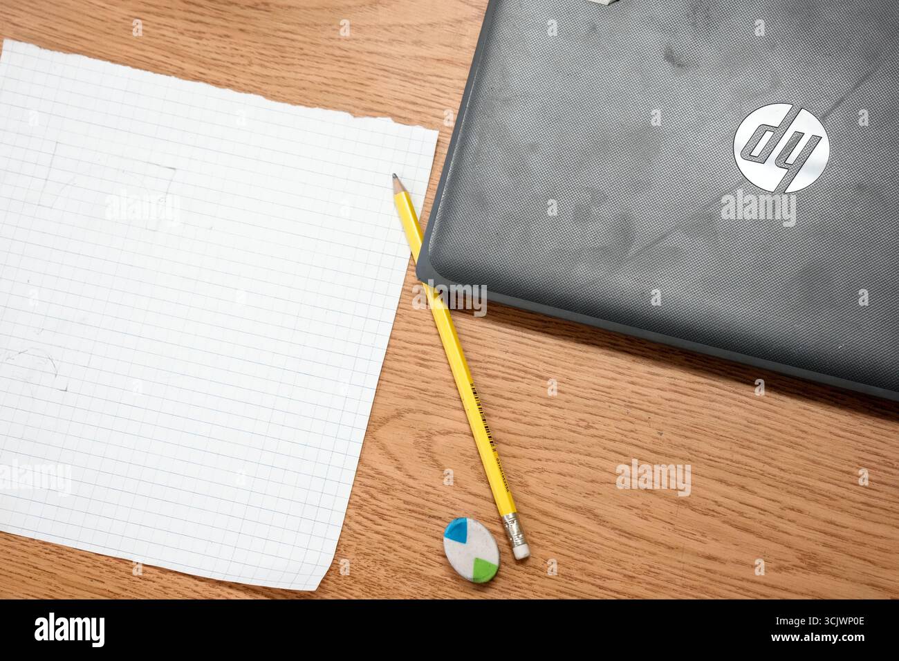 A student's TDSB laptop sits on their desk at an elementary school in ...