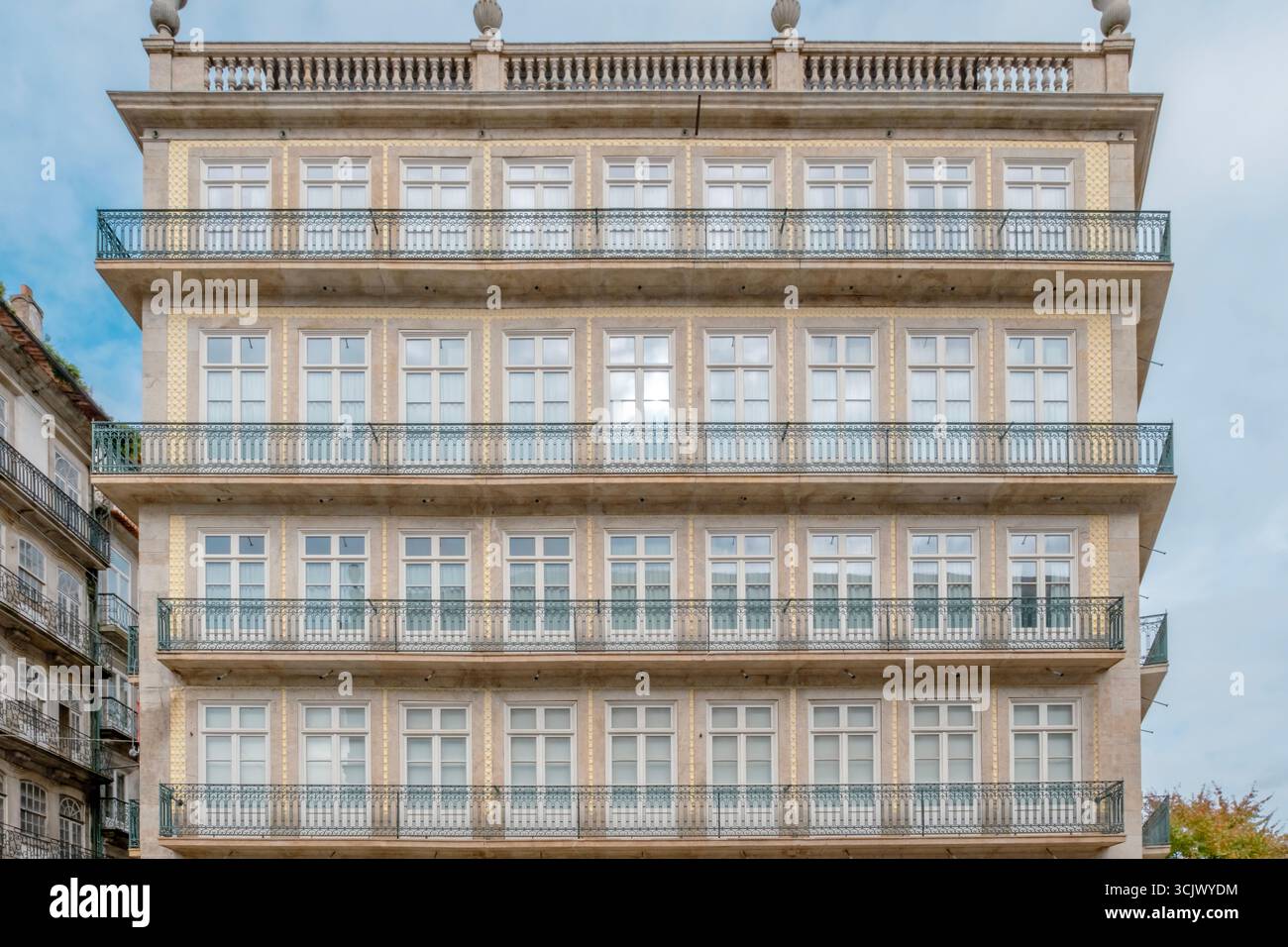 Traditional Portuguese Building Facade with Ornate Balconies and ...