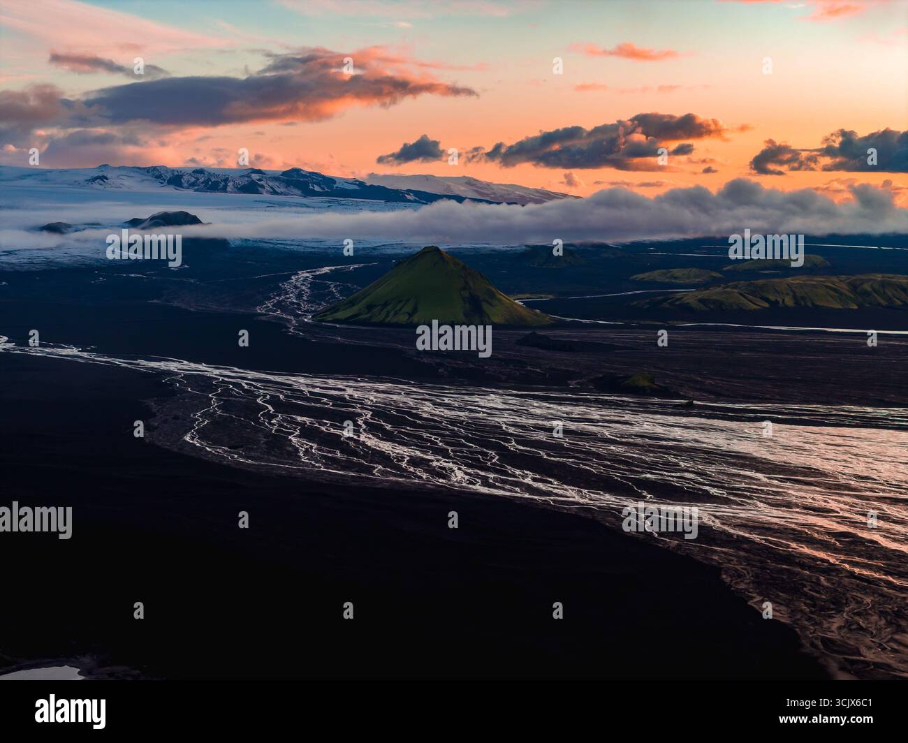 Aerial View of Icelandic Volcanic Hill, Glacier, and Sunset Stock Photo ...