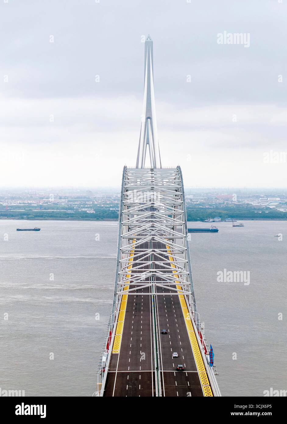 An aerial view shows traffic crossing the Changtai Yangtze River Bridge ...