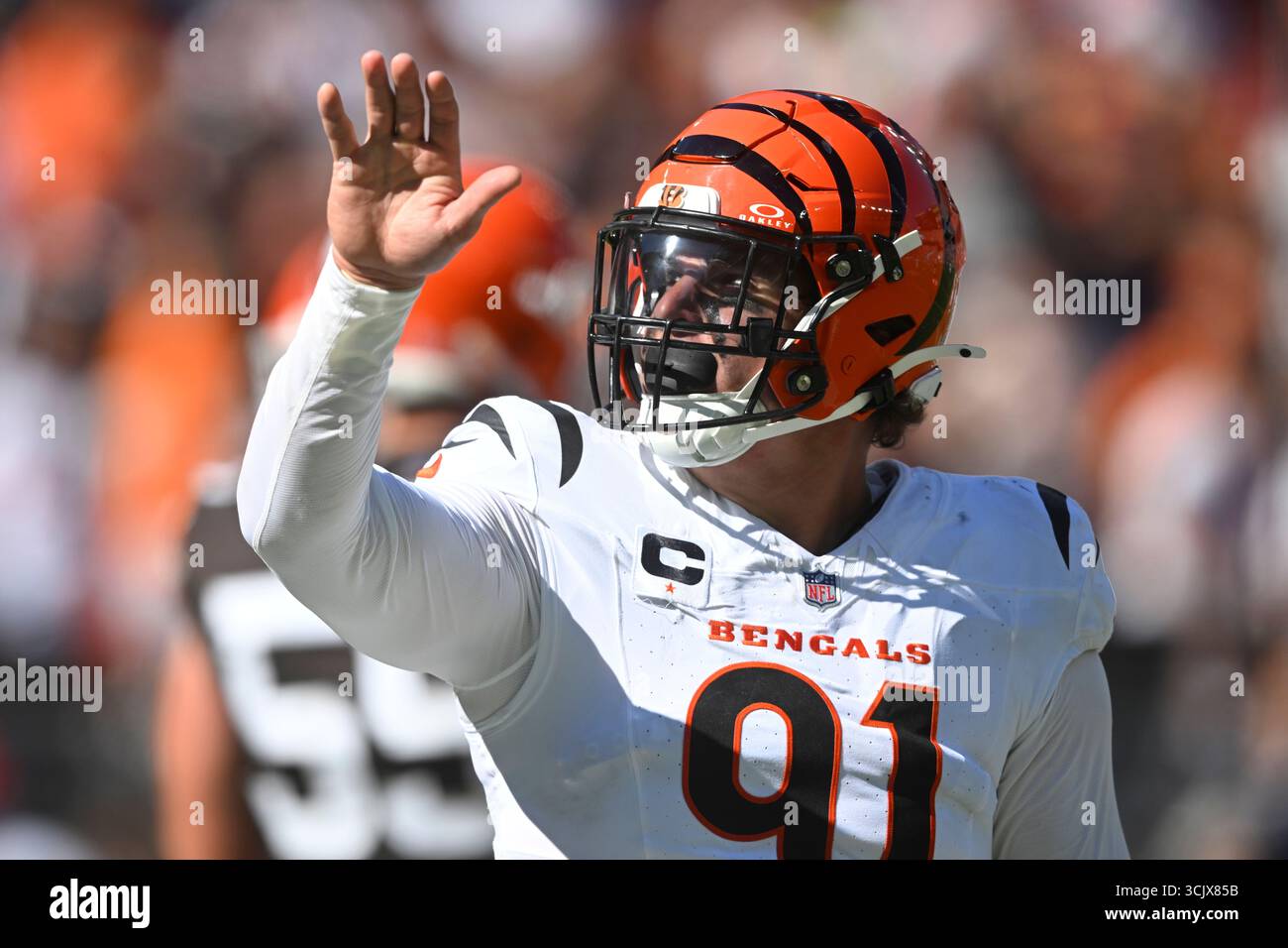Cincinnati Bengals defensive end Trey Hendrickson (91) waves to fans ...