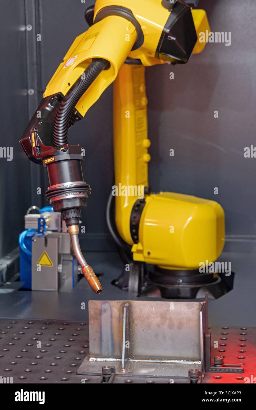 Automated Welding Torch Robot Arm Metal Beam Workshop Fabrication Stock ...