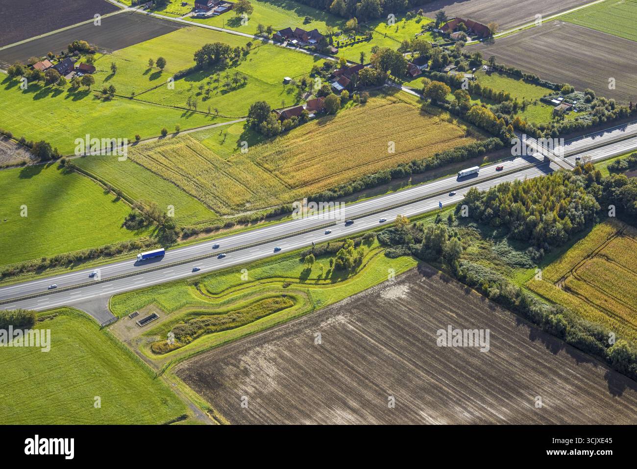 Aerial view, motorway A2 with stream under the motorway, at the bridge ...