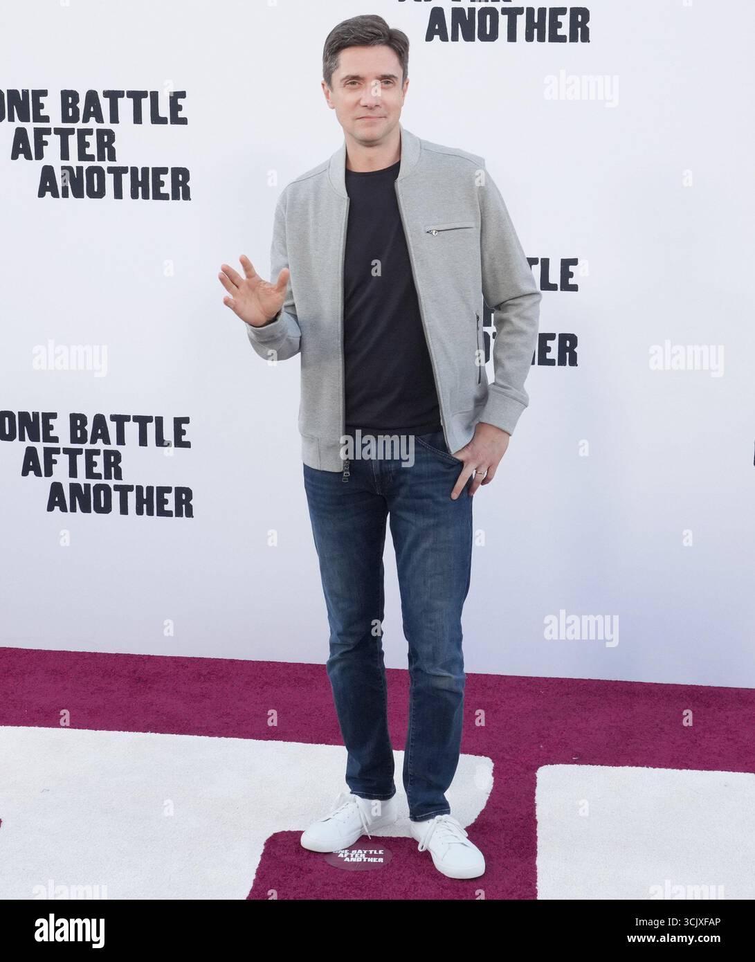Topher Grace arrives at the Warner Bros' ONE BATTLE AFTER ANOTHER World ...