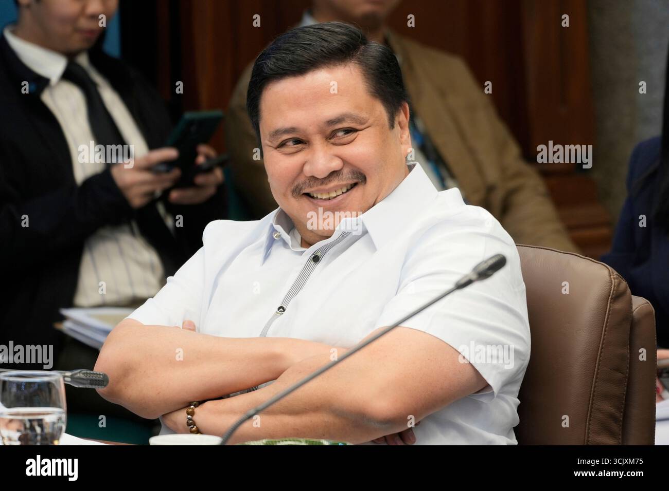 Senator Jinggoy Estrada smiles during a break in investigations on ...