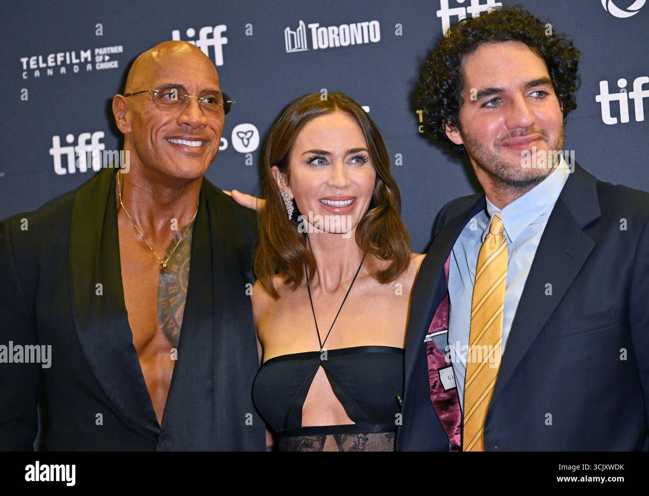 (L-R) Dwayne Johnson, Emily Blunt and director Benny Safdie attend the ...