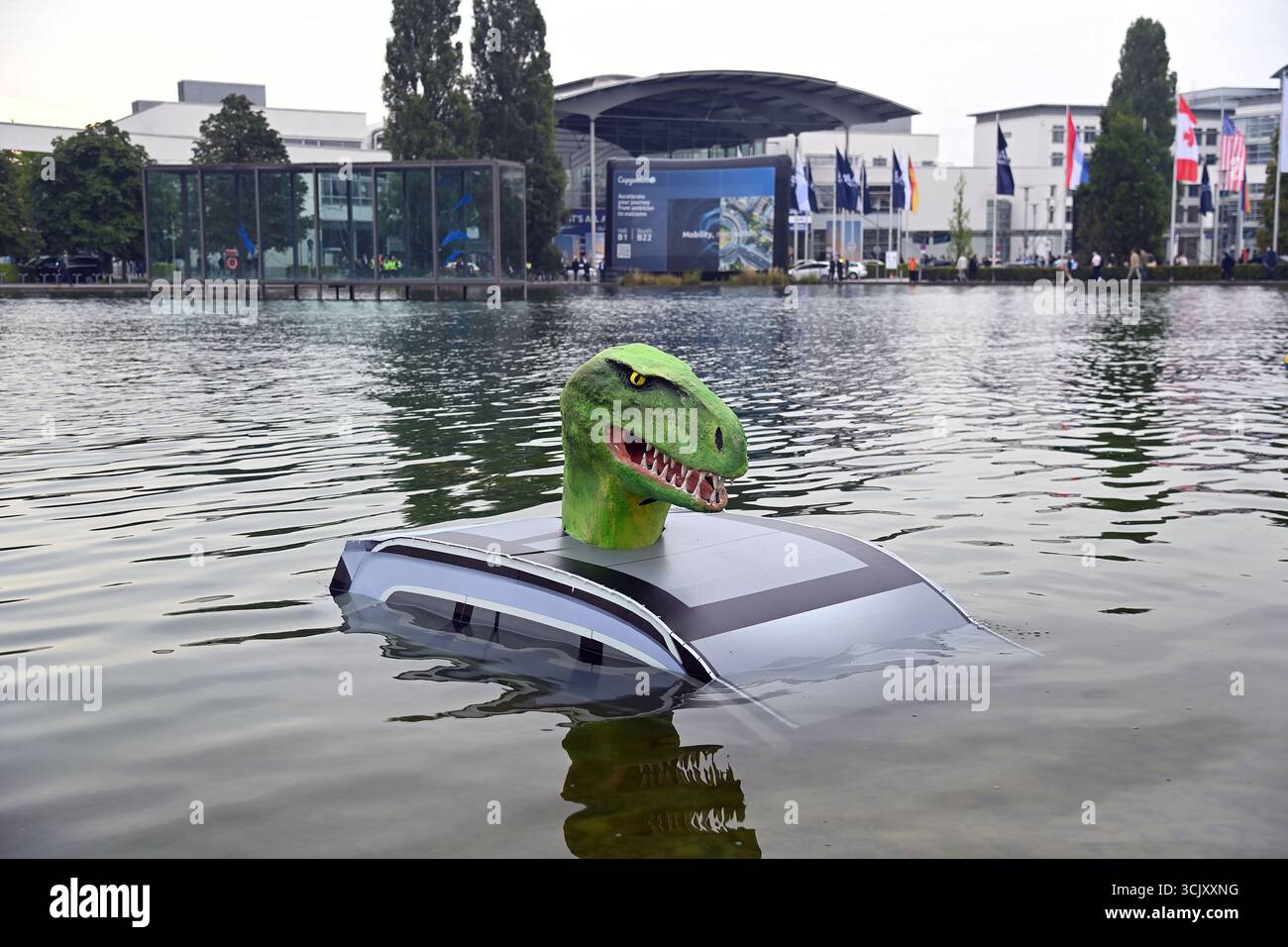 Attac protest: The car is the problem! Attac is sinking the AUTOSAURUS ...