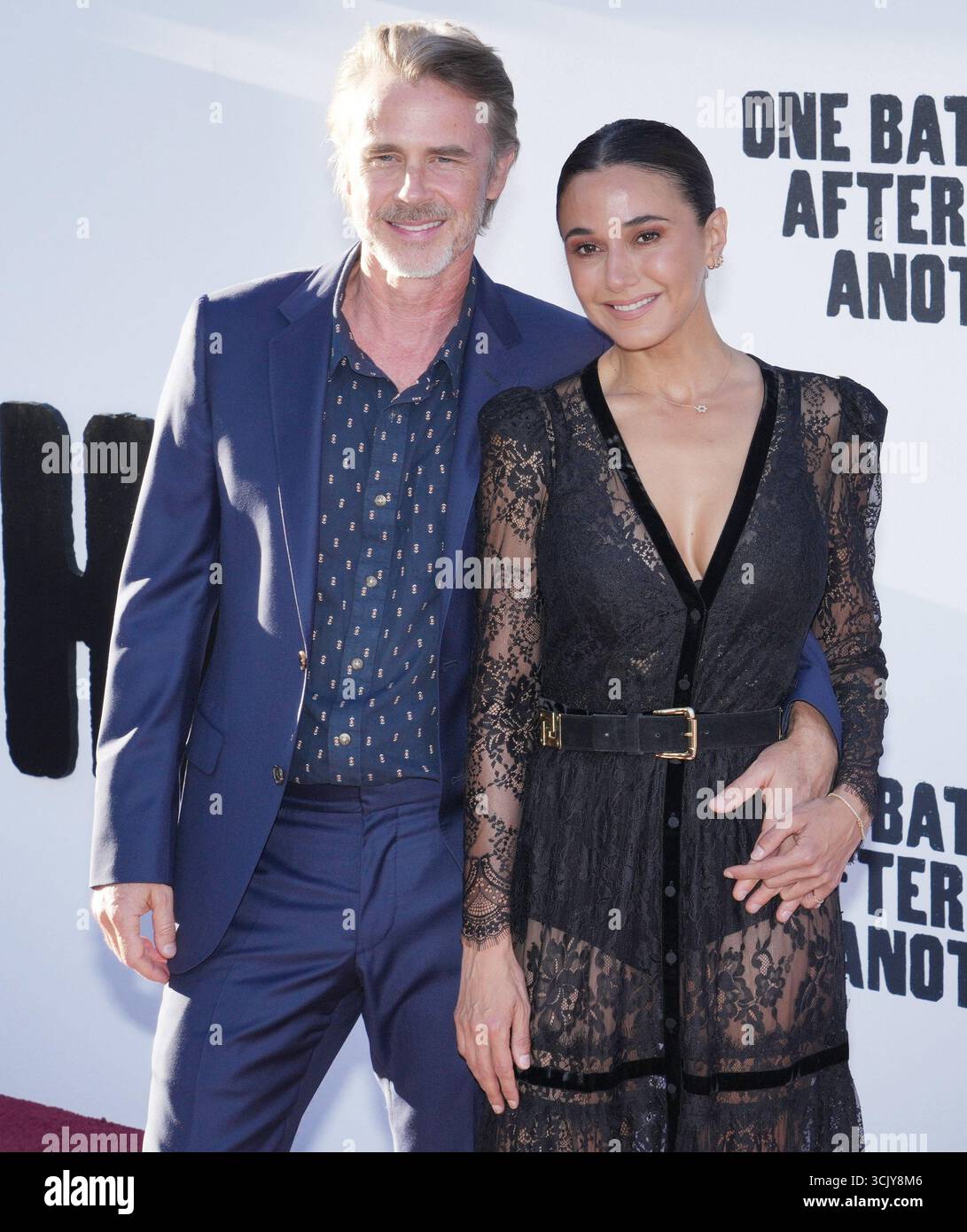 (L-R) Sam Trammel and Emmanuelle Chriqui arrives at the Warner Bros ...