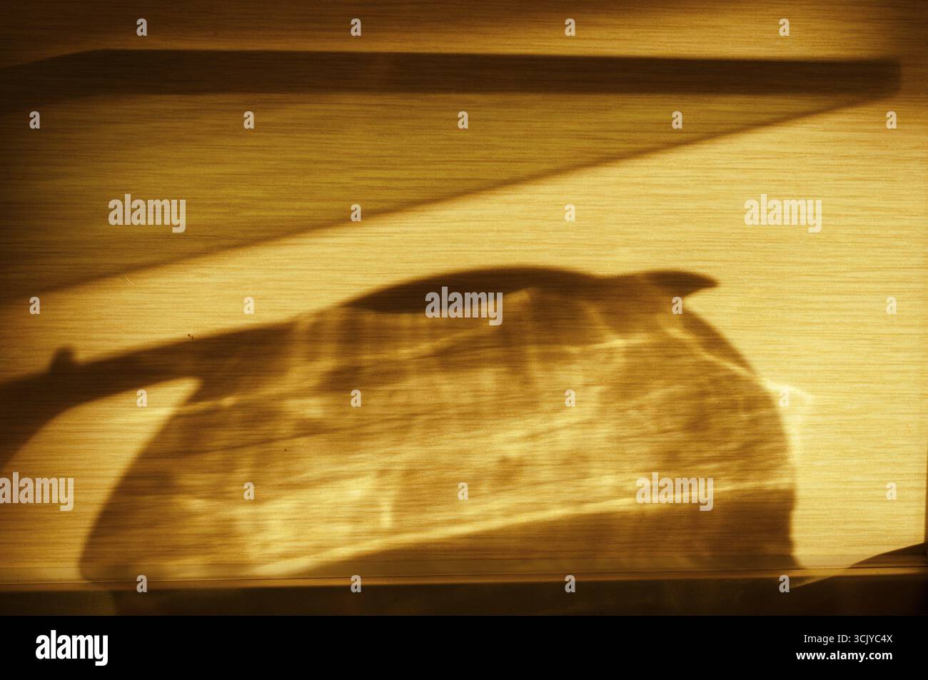 Teapot shadow on the tile kitchen wall Stock Photo - Alamy