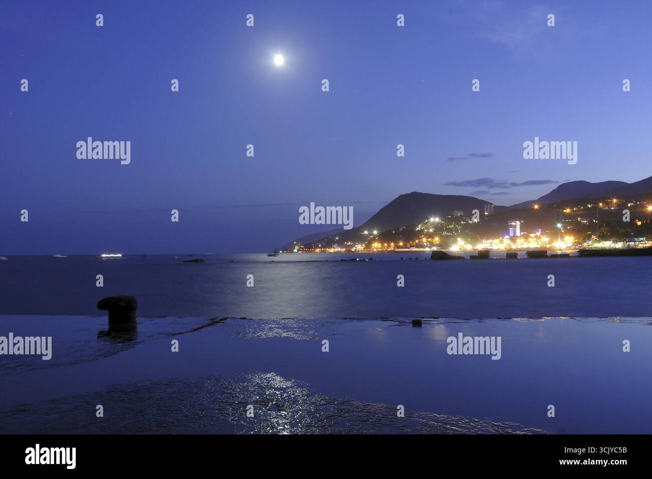Moon rising over Black sea in place of Alushta city in Crimea, Ukraine ...