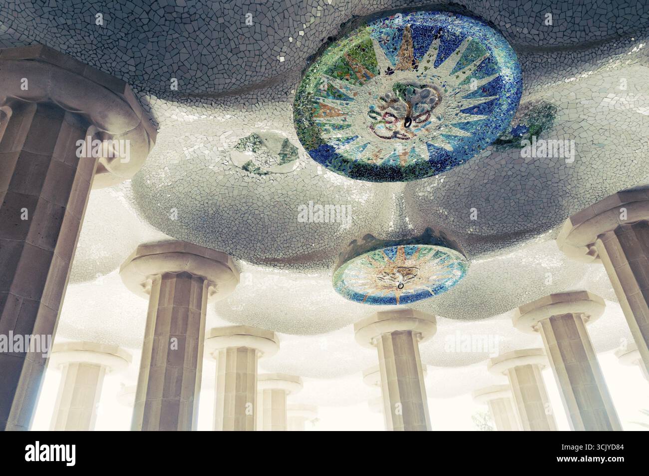 Huge columns and mosaic ceiling in famous Sala Hipostila in Park Guell ...