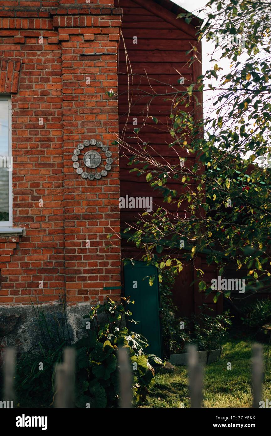 Old red brick house in the village. High quality photo Stock Photo - Alamy