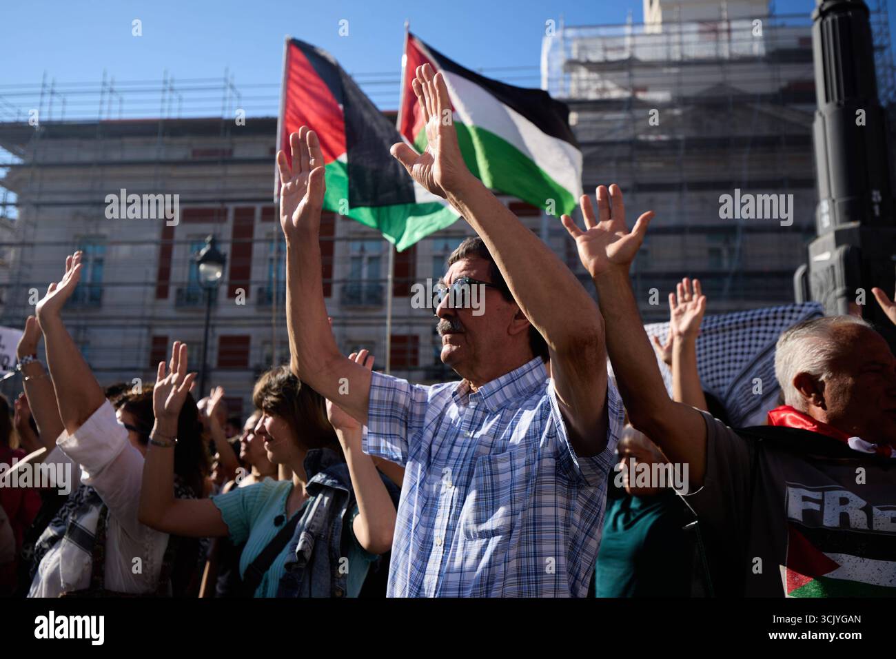 Protesters gather at Puerta del Sol in Madrid during an urgent ...