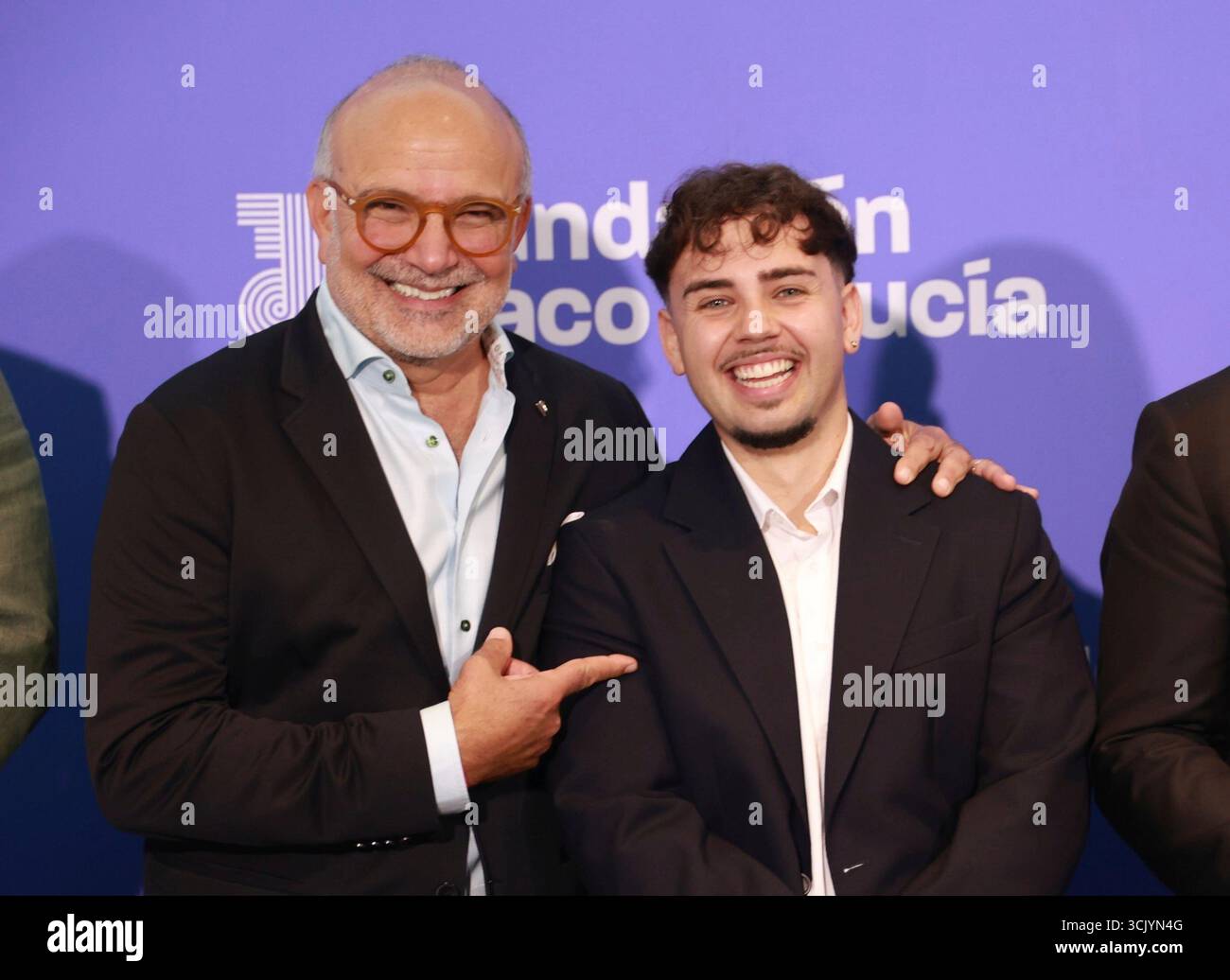 Scholarship recipient, Marcos Gago, (right) with Latin Grammy Academy ...