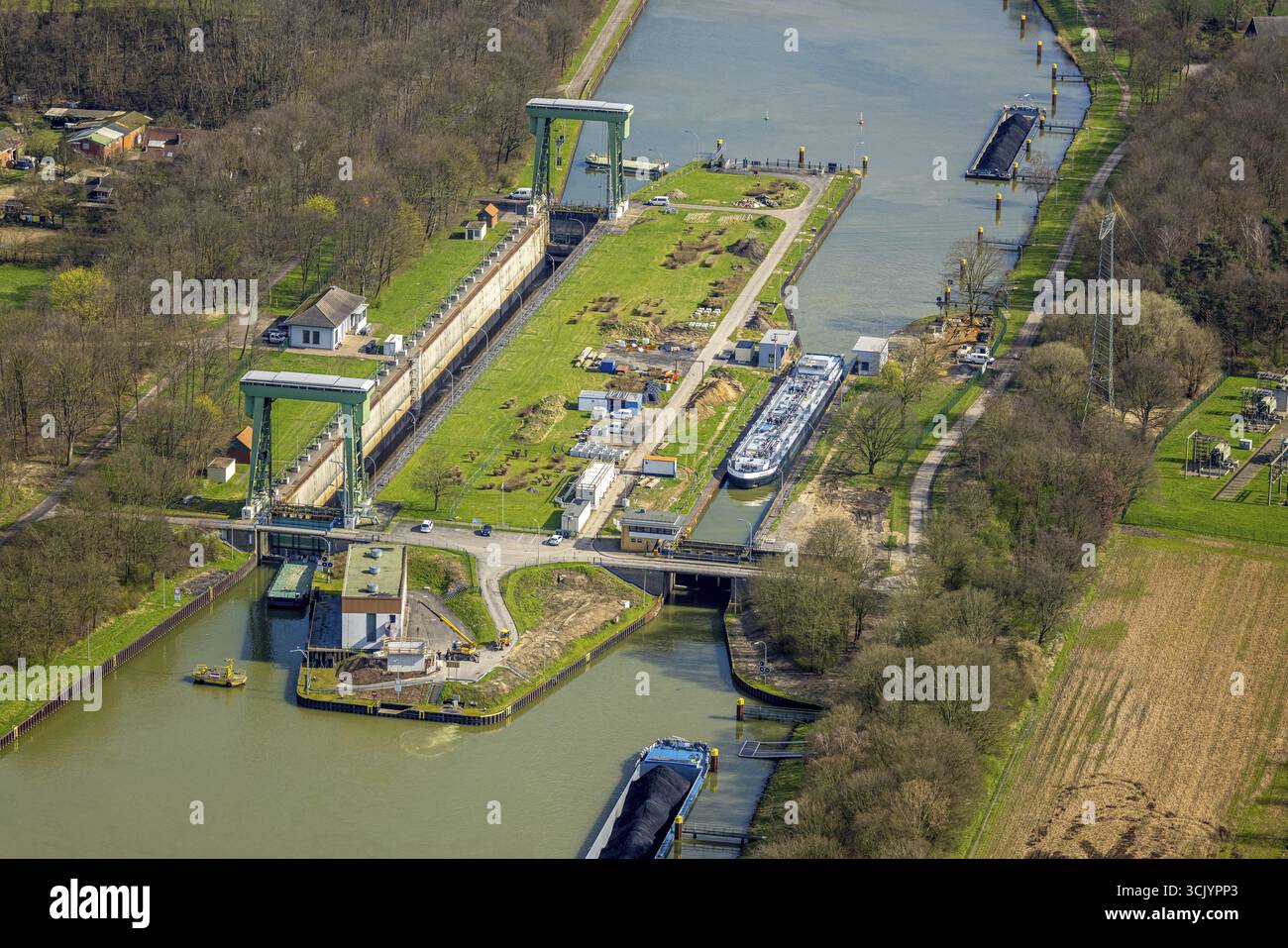 Aerial view, Huenxe lock on the Wesel-Datteln Canal with cargo ship, Huenxe, North Rhine ...