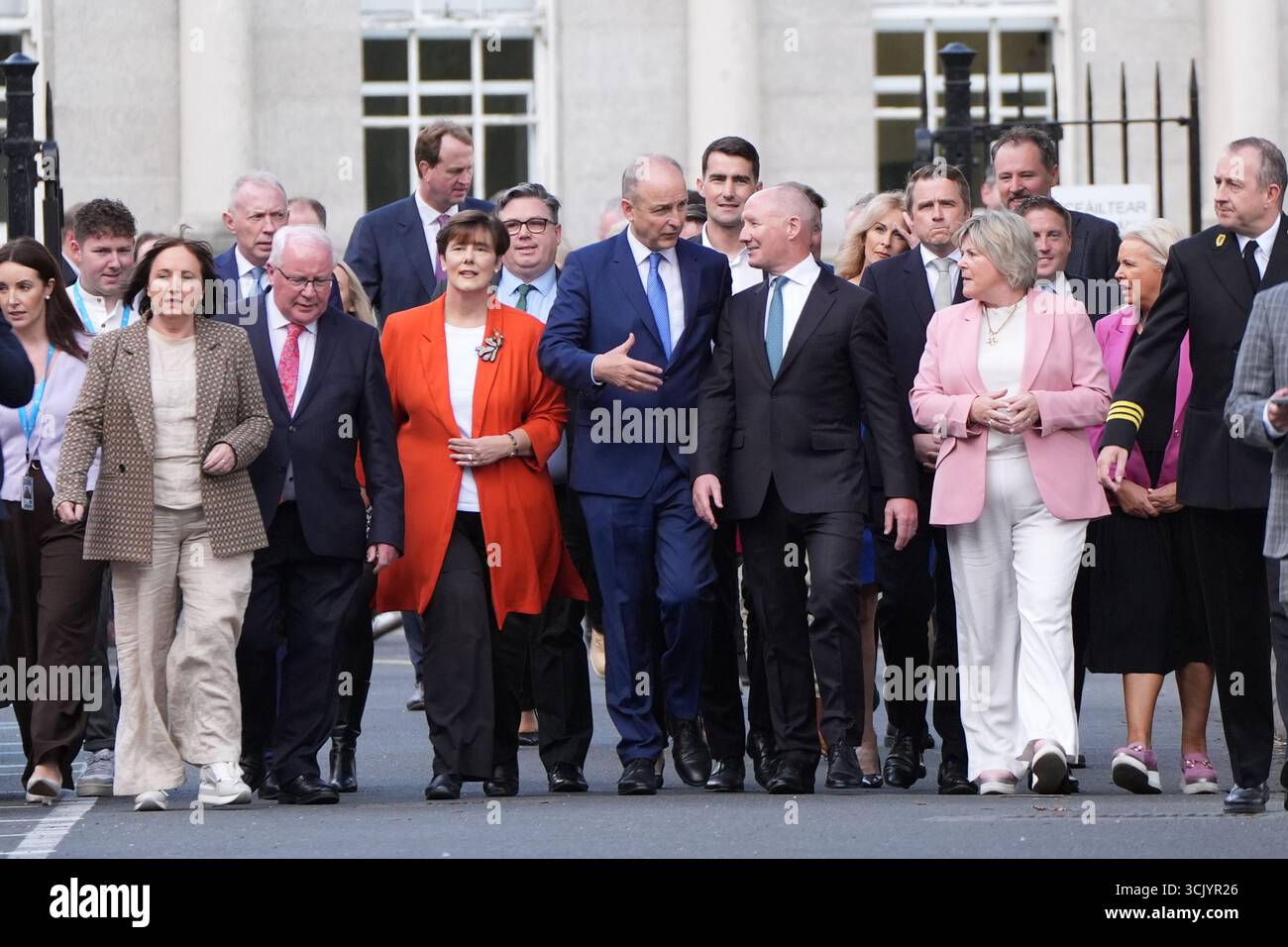 Taoiseach Micheal Martin (centre left) with former Dublin Gaelic ...