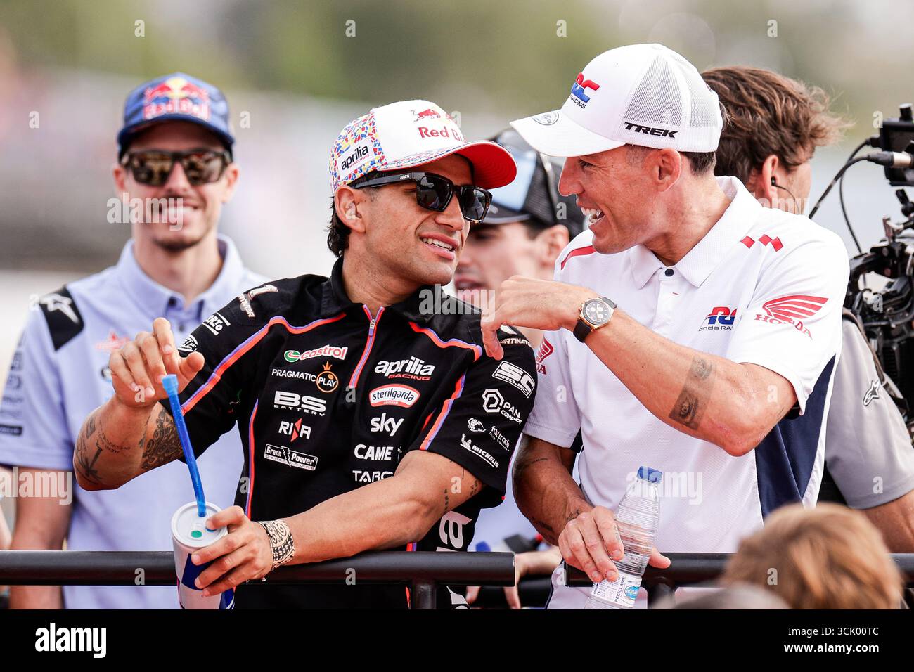 Aleix Espargaro from Spain of Honda HRC team with Jorge Martin from ...