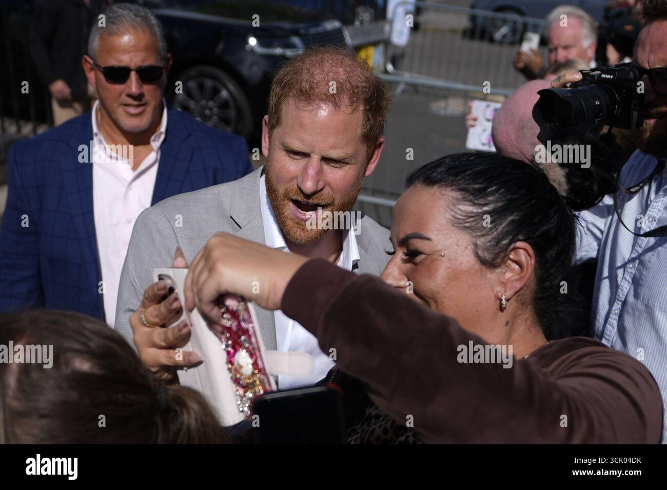 The Duke of Sussex leaves following a visit to the Community Recording ...