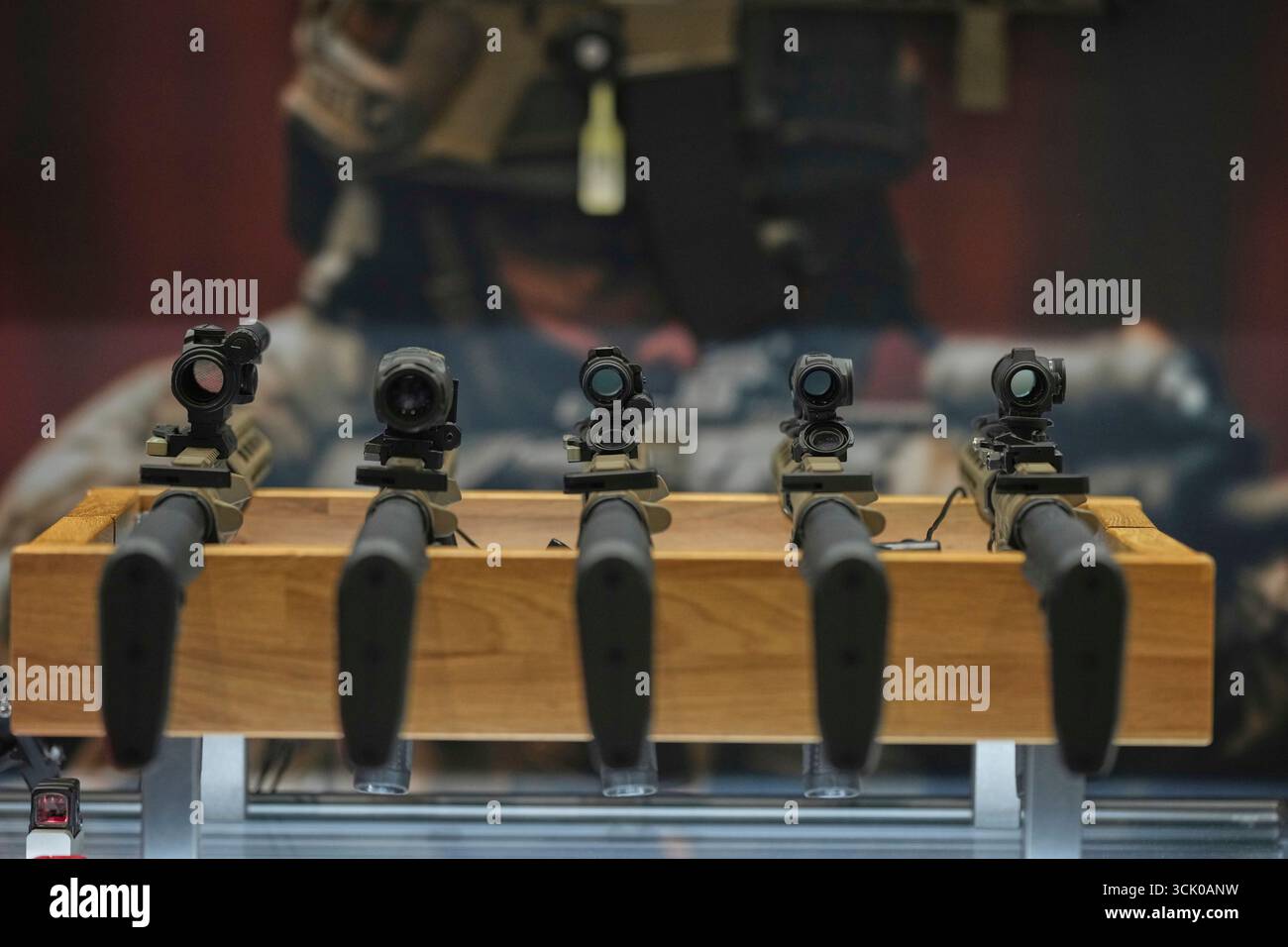 A selection of scopes made by Aimpoint on display at the DESI ...