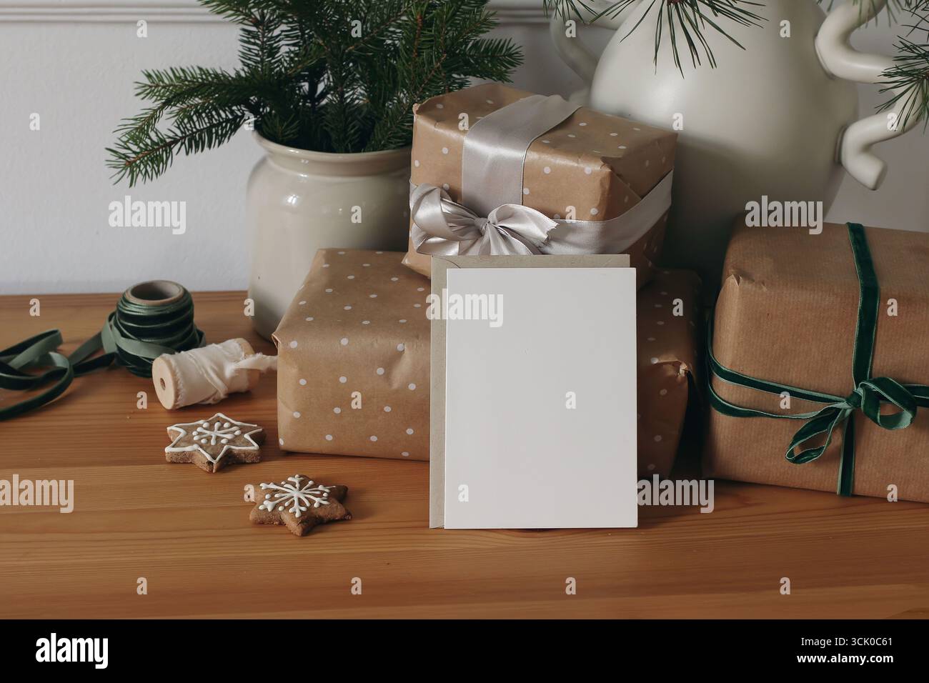 Cozy Christmas scene with wrapped gifts in brown paper, festive ribbons ...