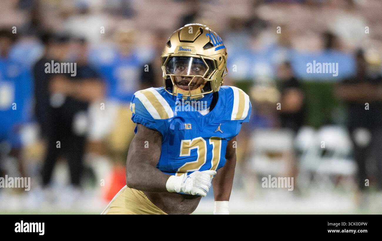 UCLA defensive back Cole Martin (21) runs during an NCAA football game ...