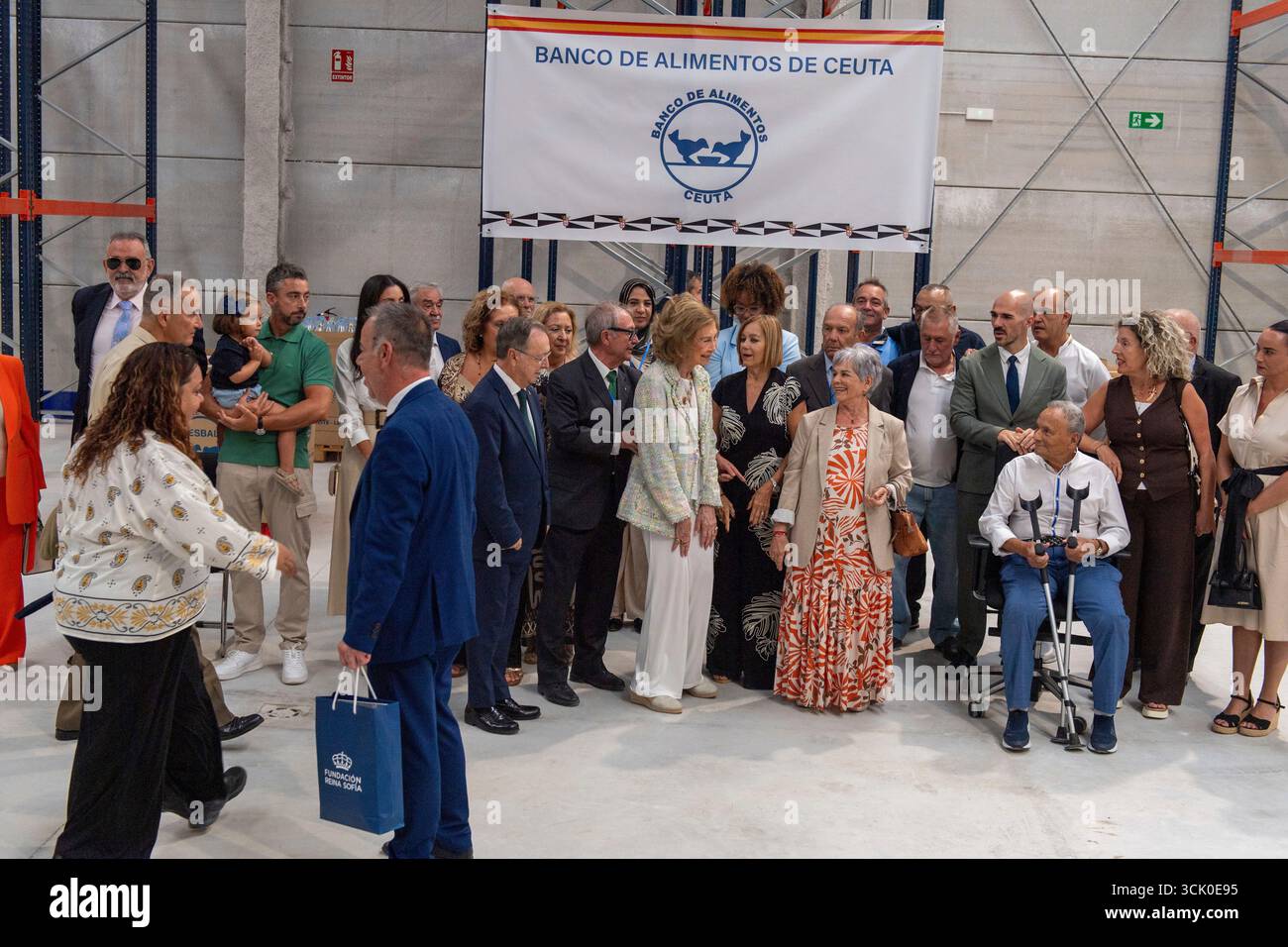 Queen Sofia (c) visits the Ceuta Food Bank Association, on September 9 ...