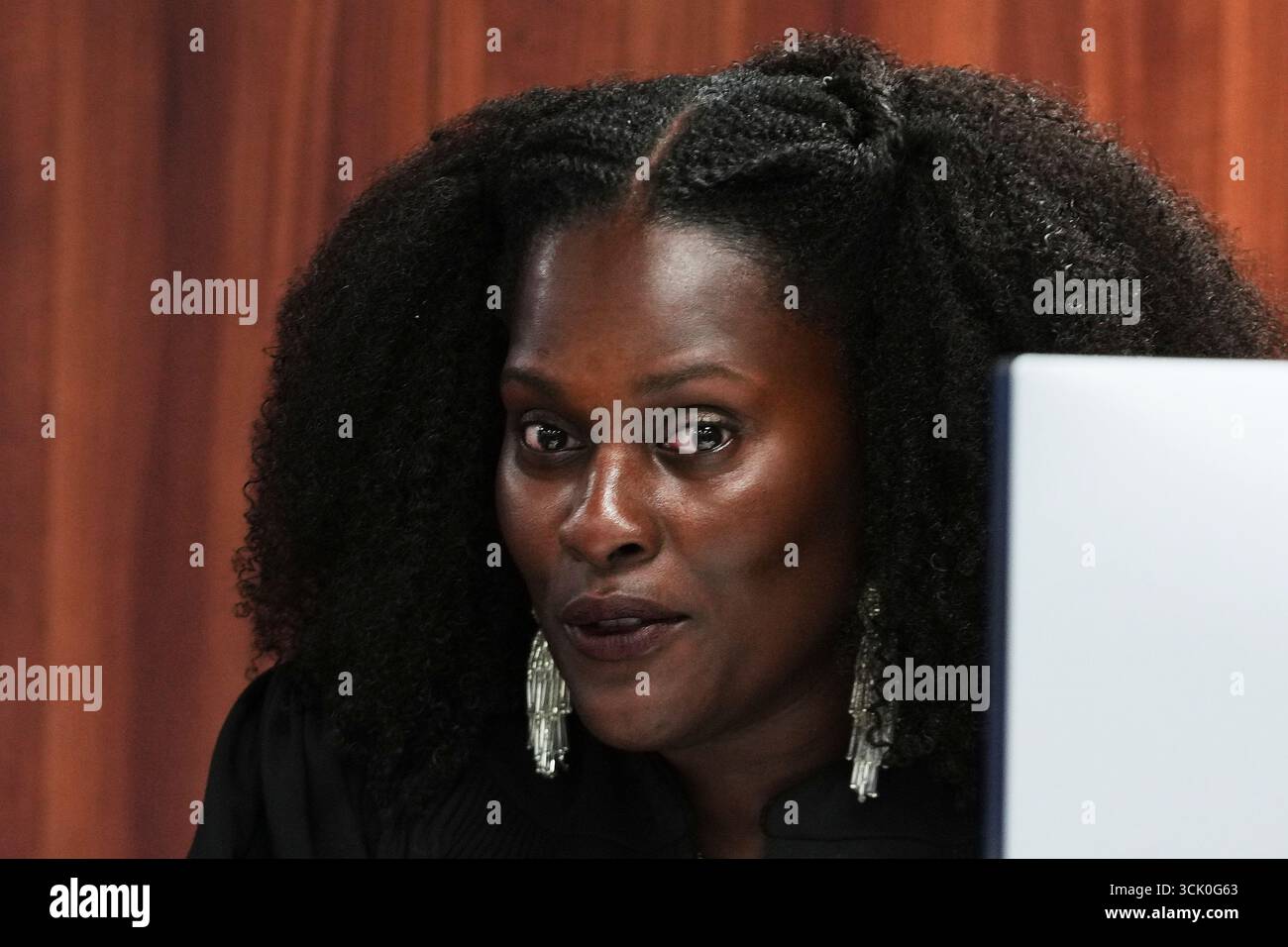 District Court Judge Kristen Simmons speaks while dismissing the ...