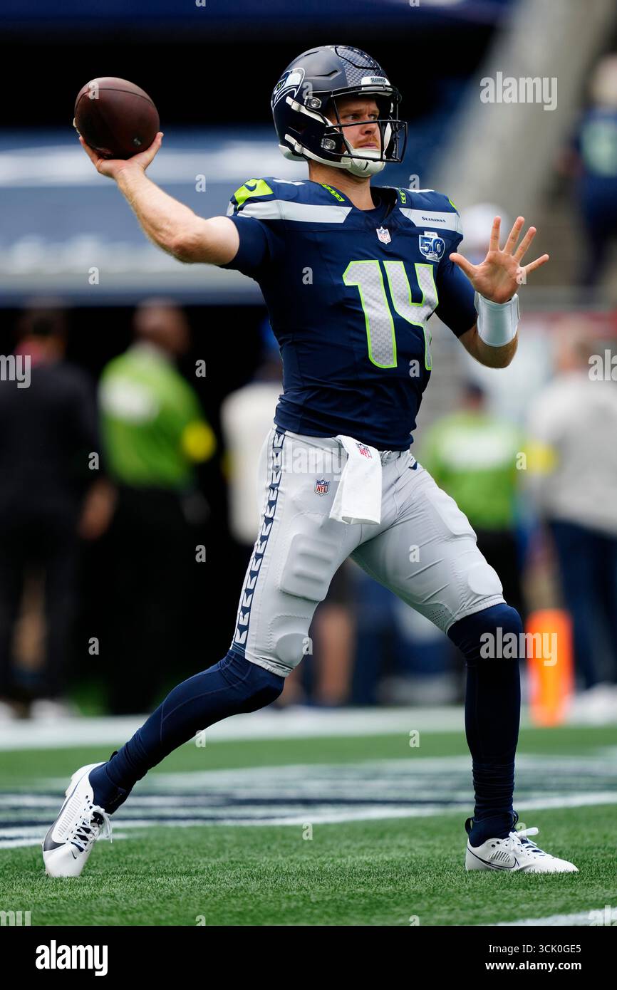 Seattle Seahawks quarterback Sam Darnold (14) passes the ball before an ...