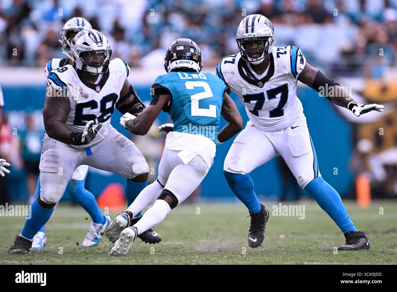 Carolina Panthers guard Damien Lewis (68) and offensive tackle Yosh ...