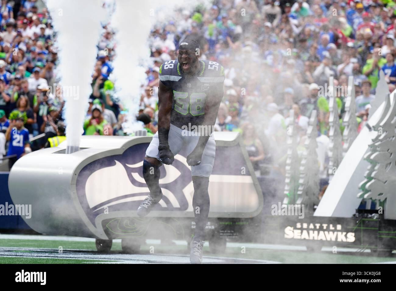 Seattle Seahawks linebacker Derick Hall (58) runs out onto the field ...