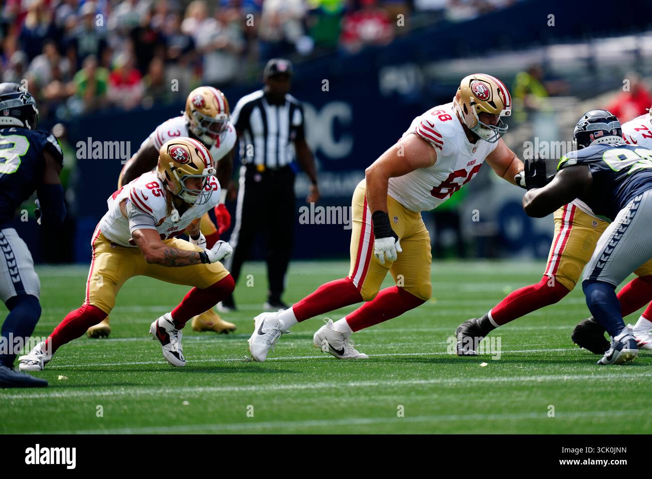 San Francisco 49ers offensive tackle Colton McKivitz (68) and tight end ...