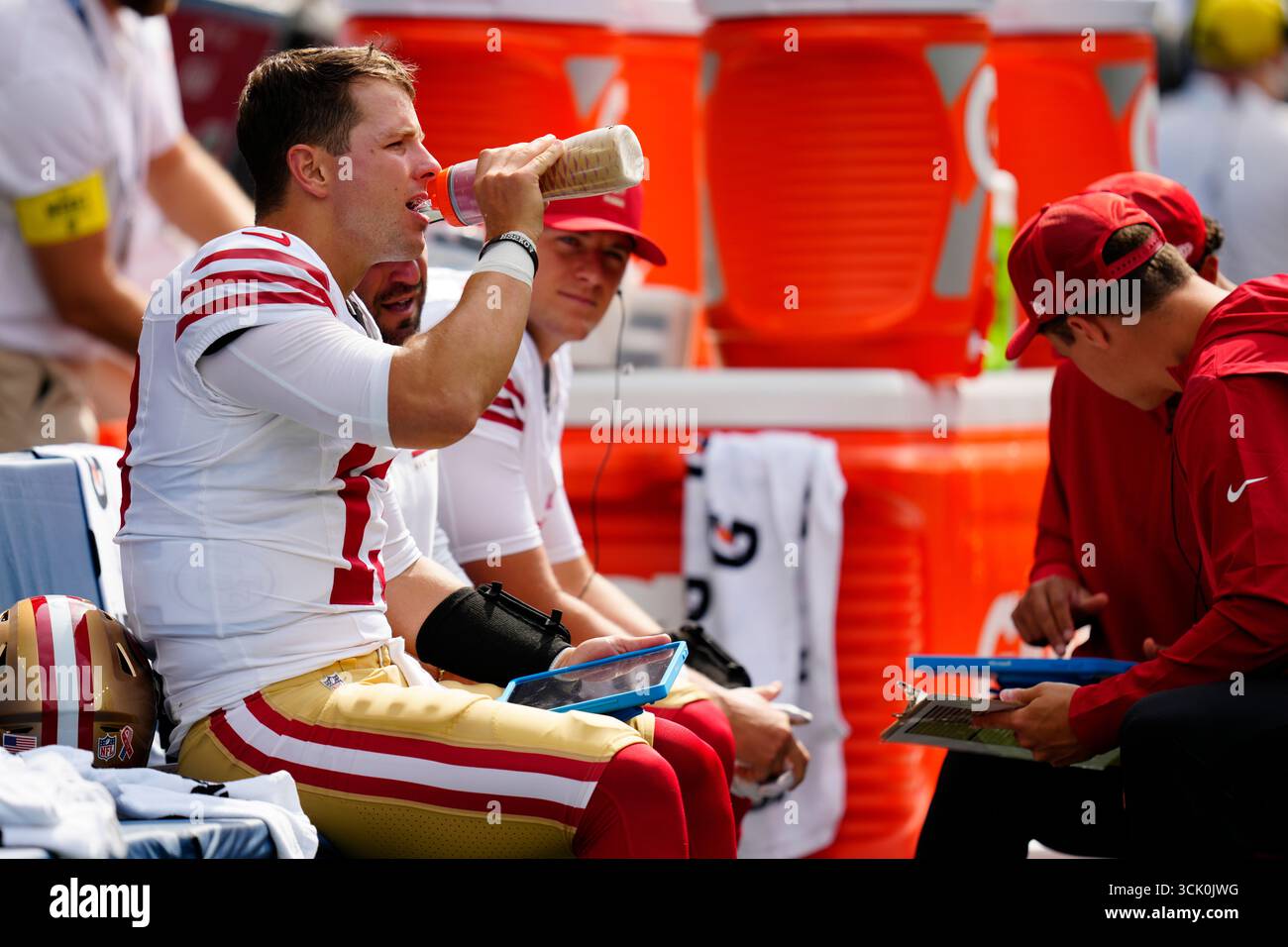 San Francisco 49ers quarterback Brock Purdy (13) drinks from a Gatorade ...