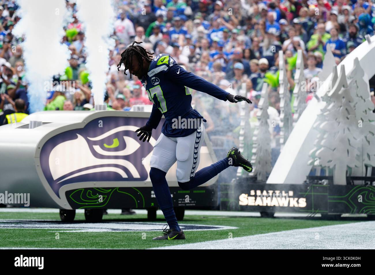 Seattle Seahawks cornerback Riq Woolen (27) runs out onto the field ...