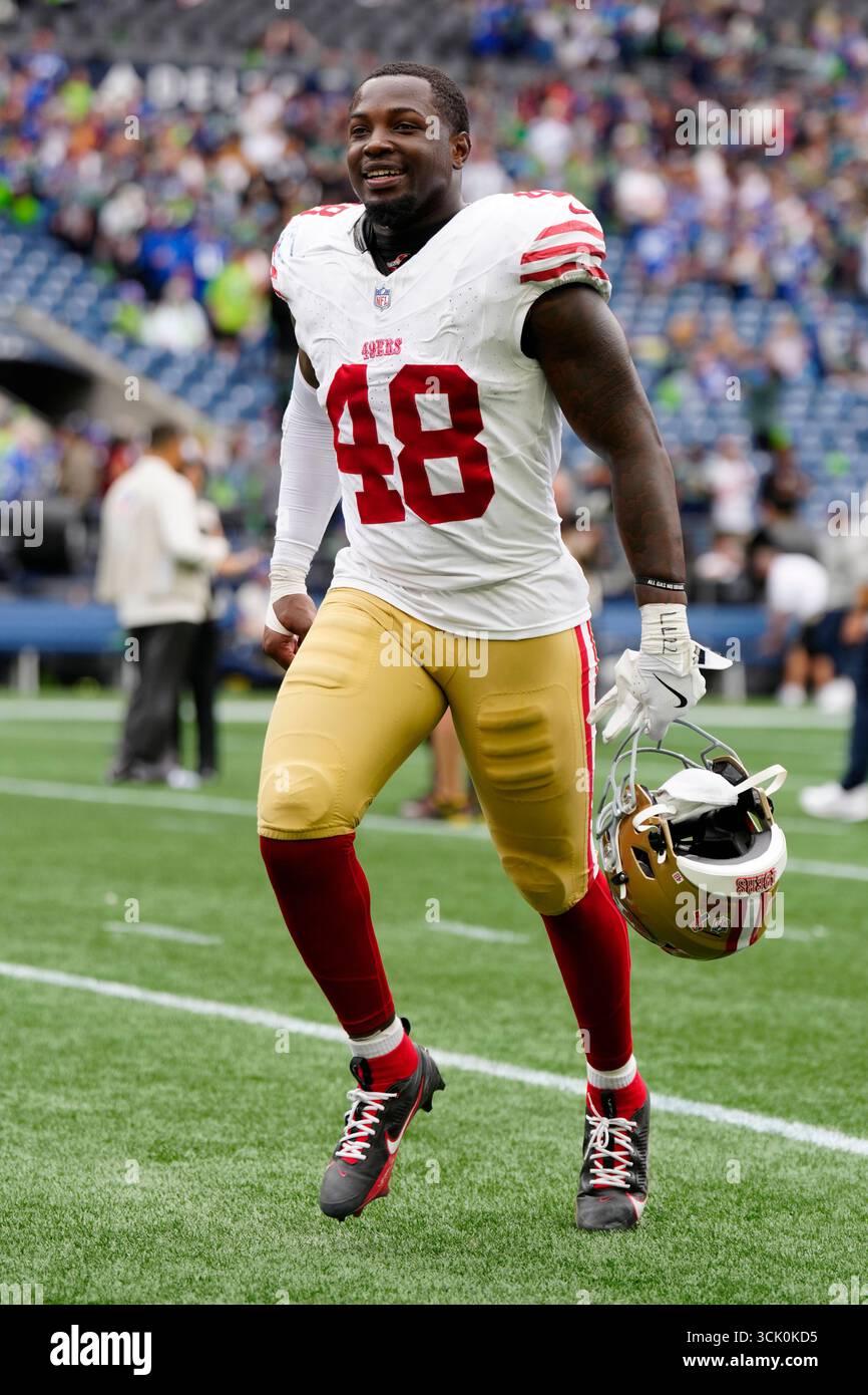 San Francisco 49ers linebacker Tatum Bethune (48) walks off the field ...
