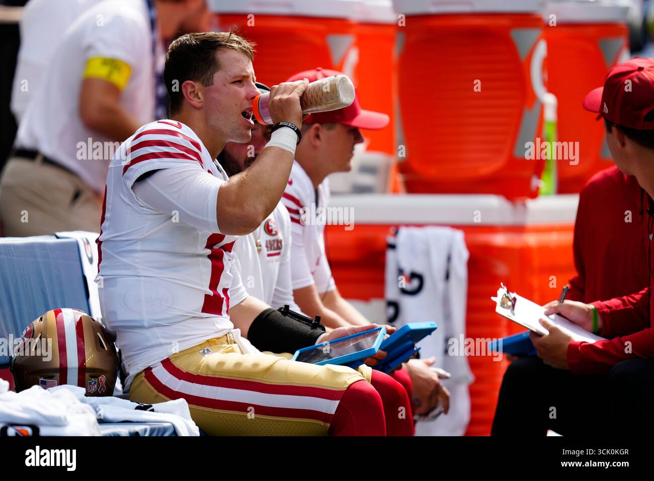 San Francisco 49ers quarterback Brock Purdy (13) drinks from a Gatorade ...