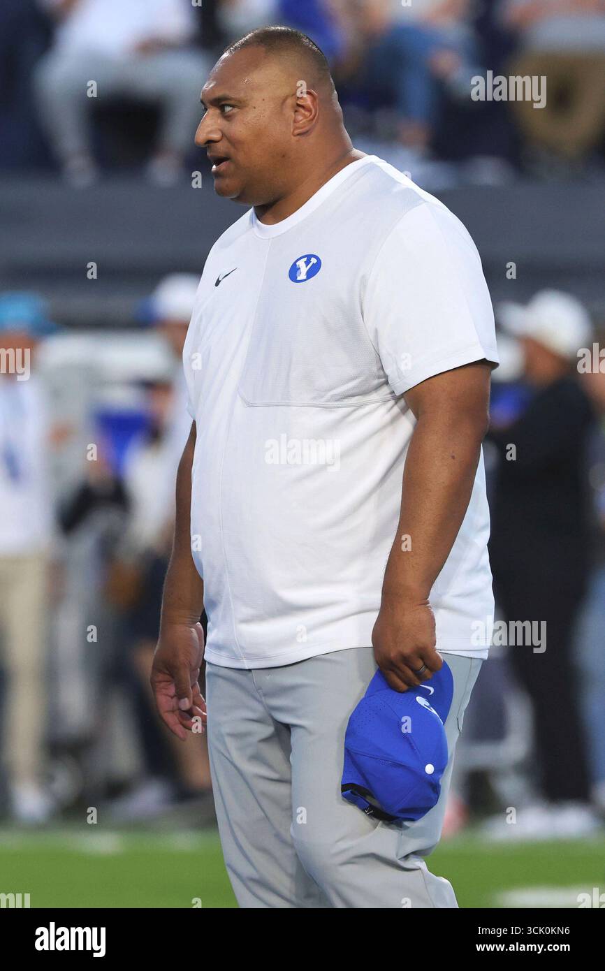 BYU head coach Kalani Sitake watches warm ups during an NCAA college ...