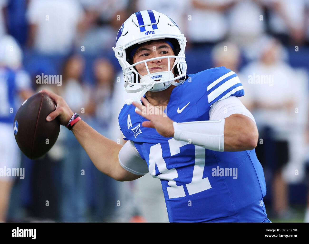 BYU quarterback Bear Bachmeier warms up against Stanford during pregame ...