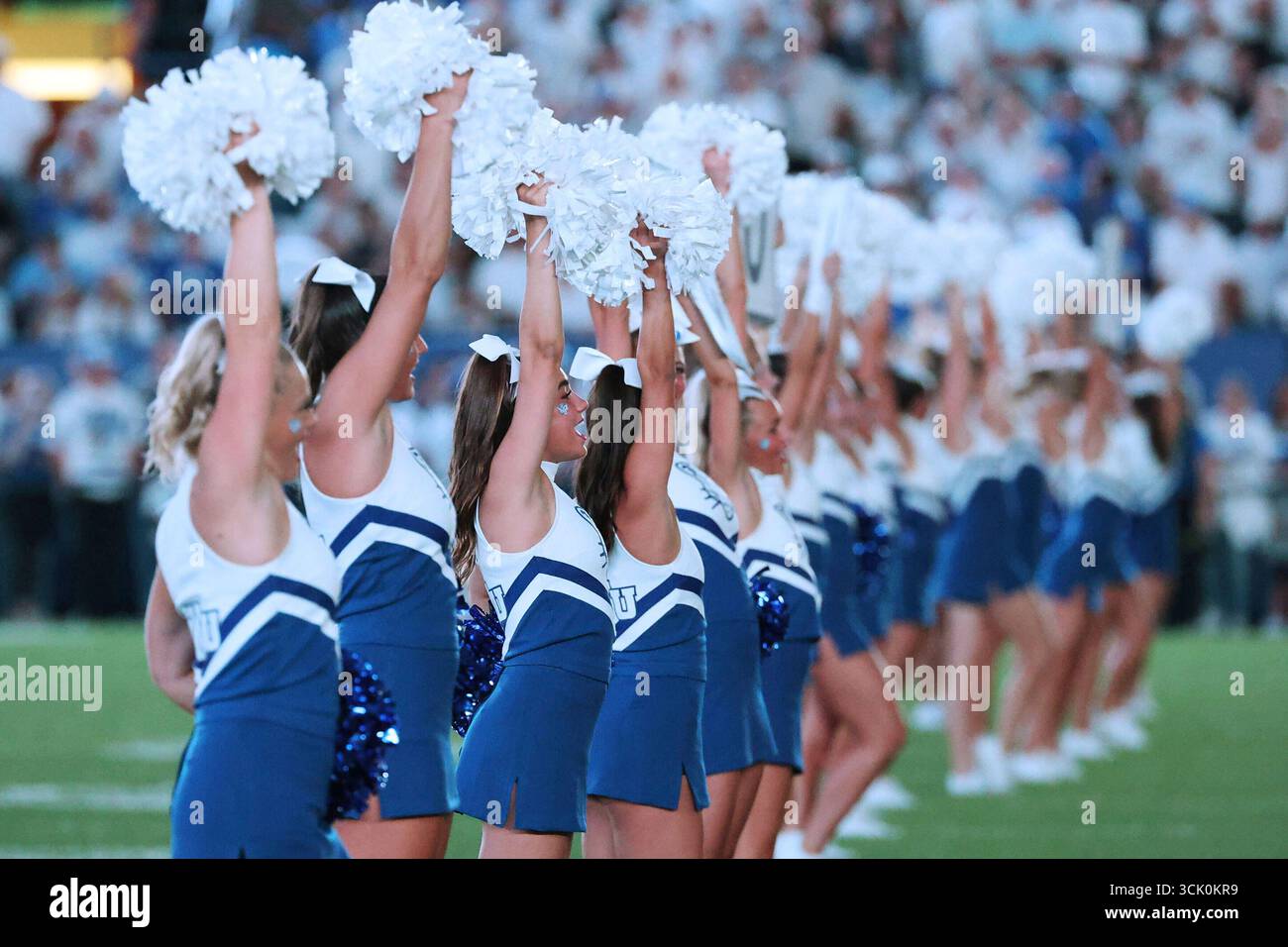 BYU cheerleaders perform during an NCAA college football game Saturday ...